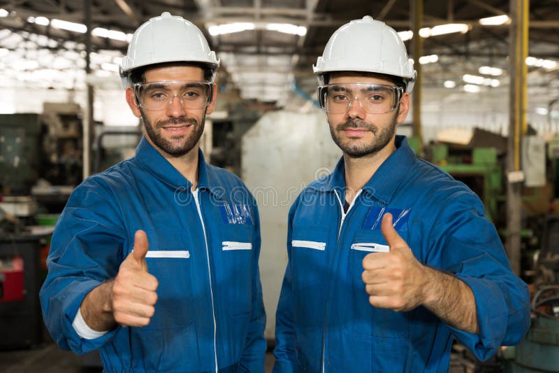 Industrial Workers are Working on Projects in Large Industrial Plants ...