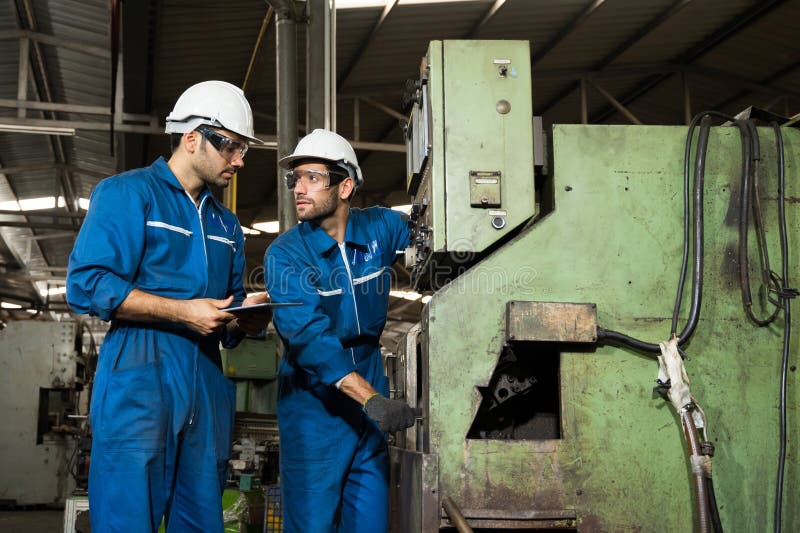 Industrial Workers are Working on Projects in Large Industrial Plants ...