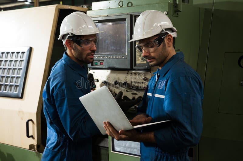 Industrial Workers are Working on Projects in Large Industrial Plants ...