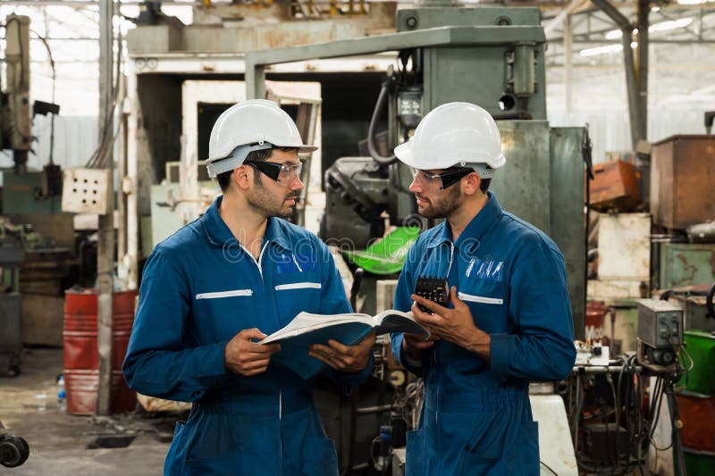 Industrial Workers are Working on Projects in Large Industrial Plants ...