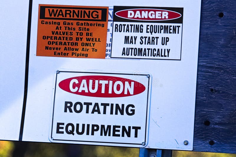 An Industry Caution Rotating Equipment Warning Sign Stock Image - Image ...
