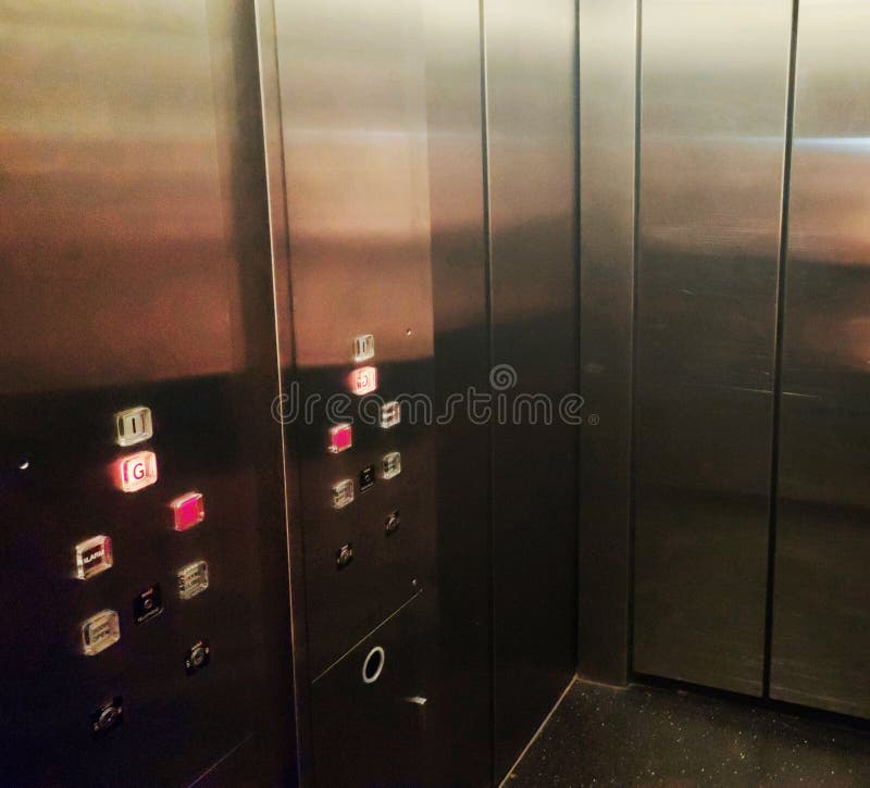 Industry Elevator with Red Button Lights and Architecture Reflections ...