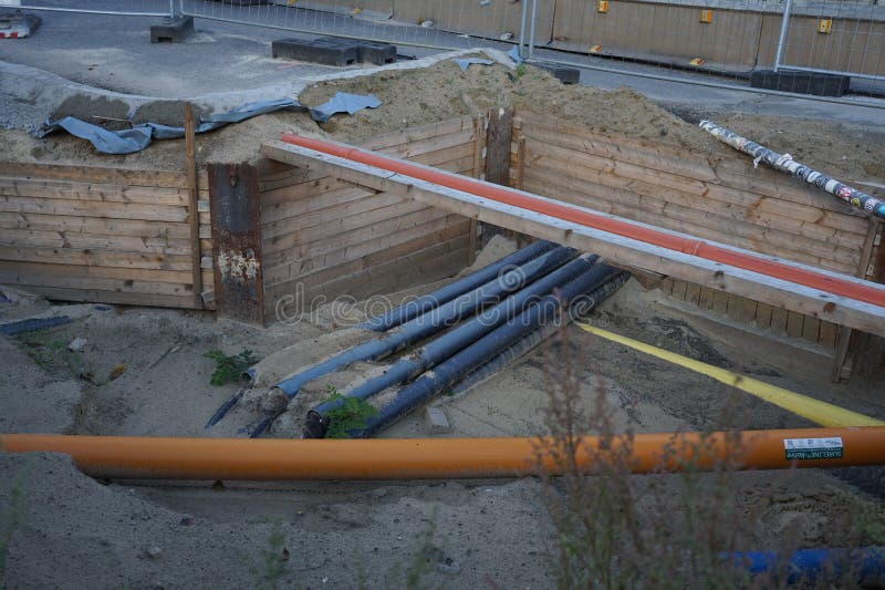 Communication Pipes are Laid Under the Road. Berlin, Germany Stock ...