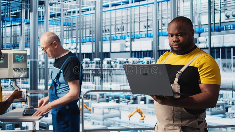 Industry 4.0 Industrial Plant Engineer Automating Robotic Machines ...