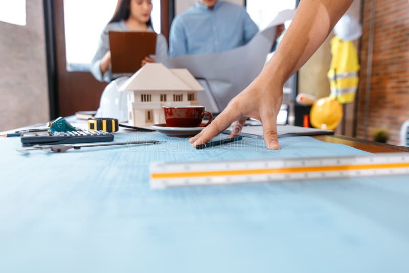 Architect Reading Building and Drawing Outlay Construction Plan As ...