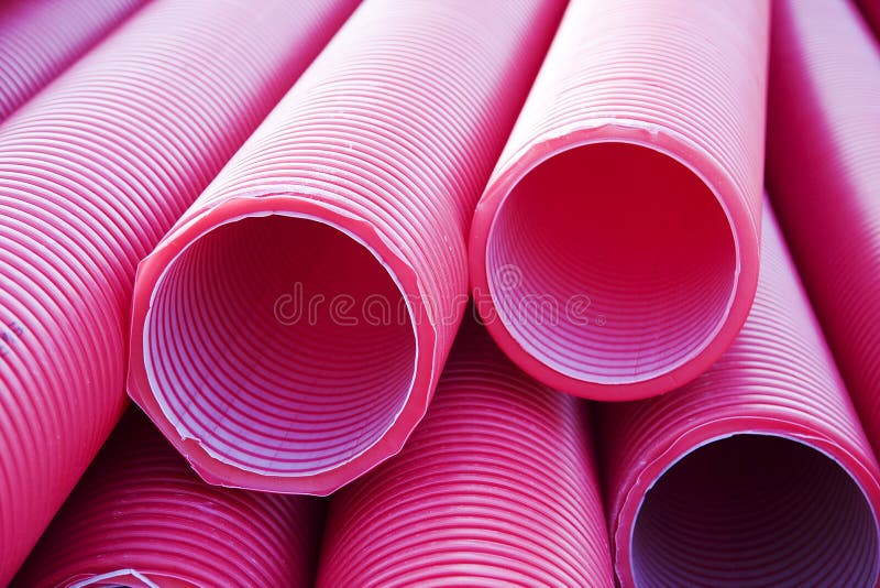 Red plastic pipes stock image. Image of build, striped - 731821