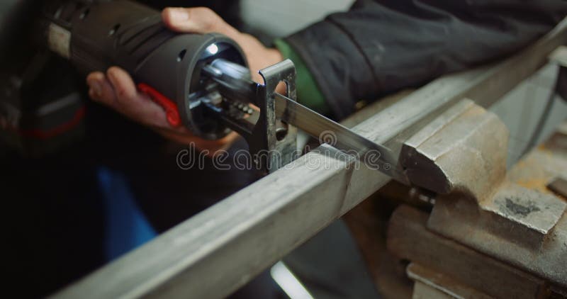 Industry Worker Metal Part with Electric Hacksaw Stock Footage - Video ...