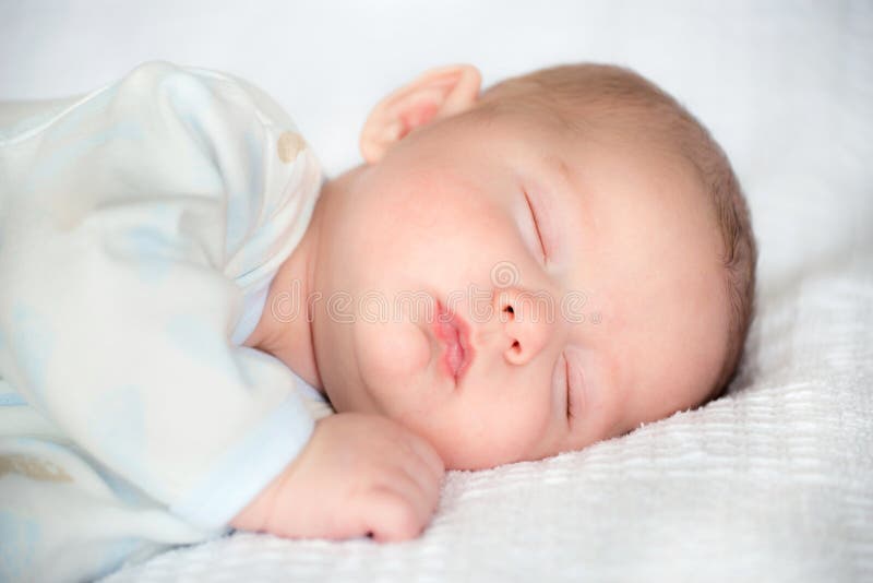 Infant baby boy sleeping stock image. Image of laugh - 38109215