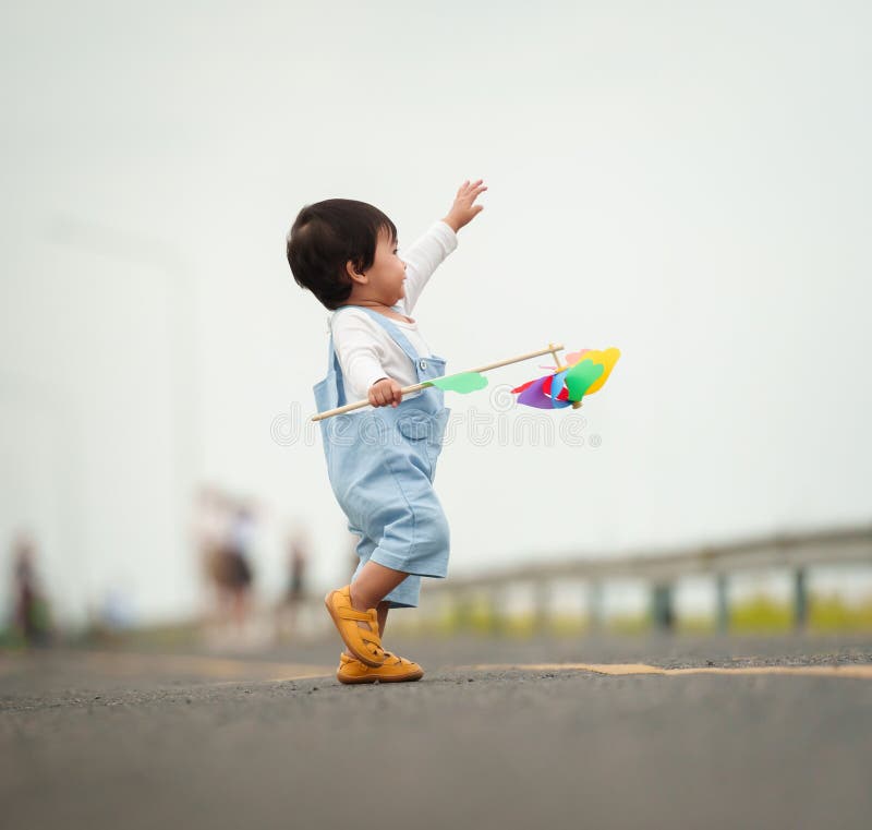 Infant Baby Learning To Walking First Step on Pathway Stock Image ...