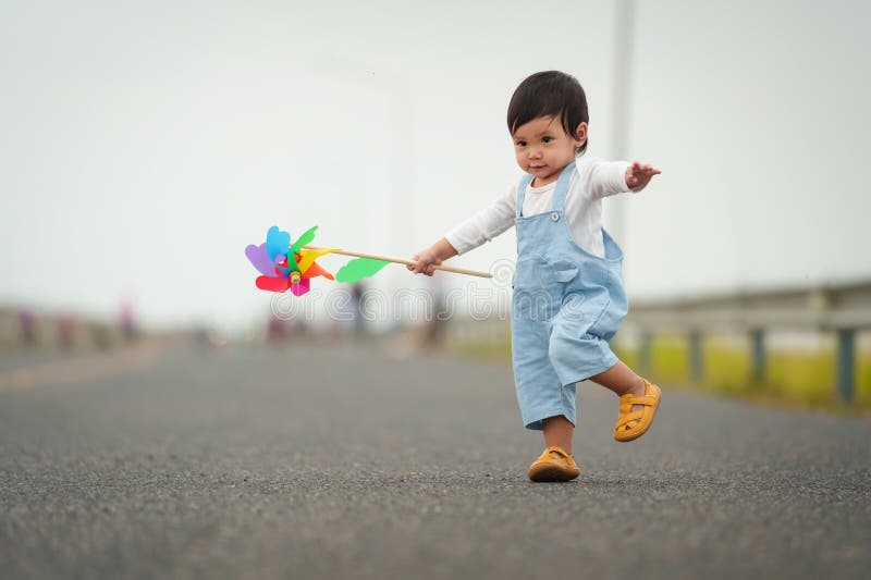 Infant Baby Learning To Walking First Step on Pathway Stock Photo ...