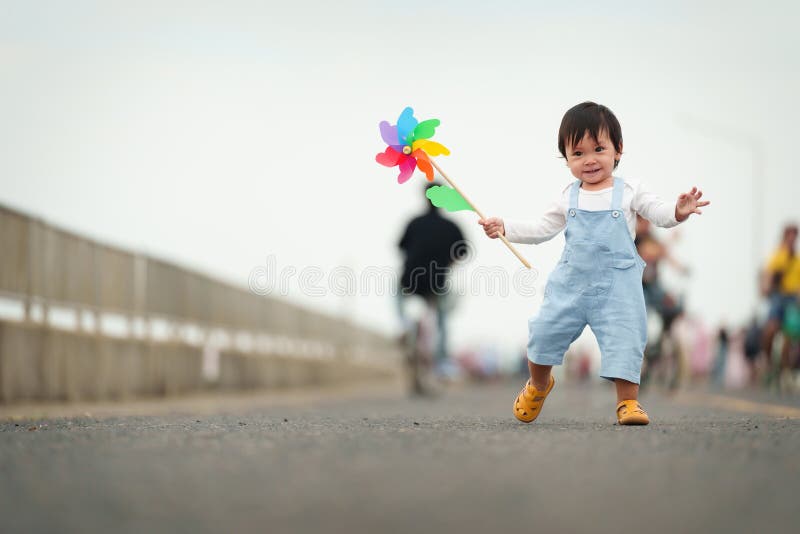 Infant Baby Learning To Walking First Step on Pathway Stock Image ...