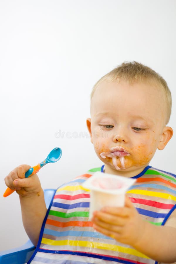 Infant Eating Yoghurt Messily Stock Image - Image of individuals ...