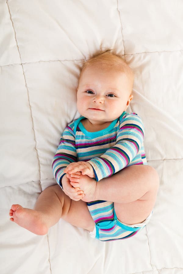 Infant girl stock image. Image of comfortable, cute, laughing - 22855009