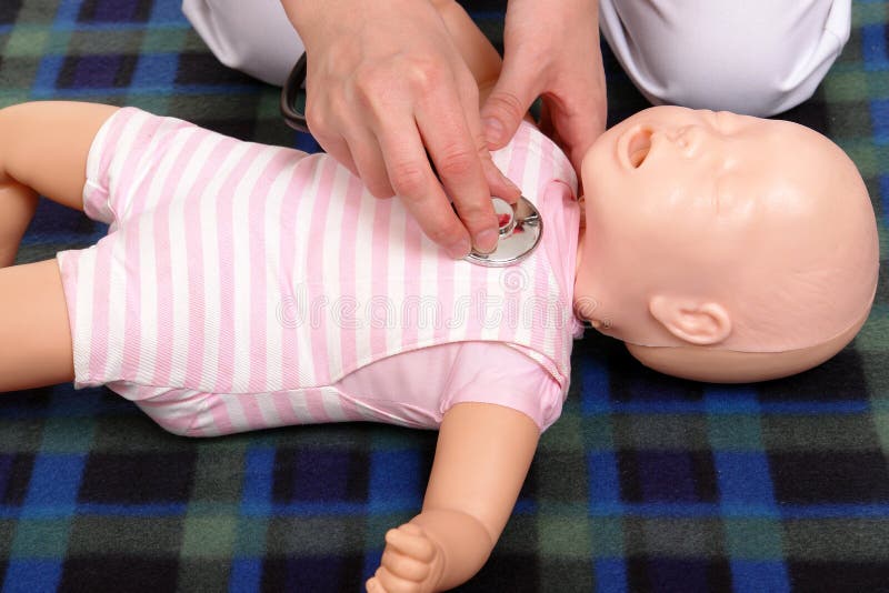 Infant Pulse Check Demonstration Stock Photo - Image of artificial ...