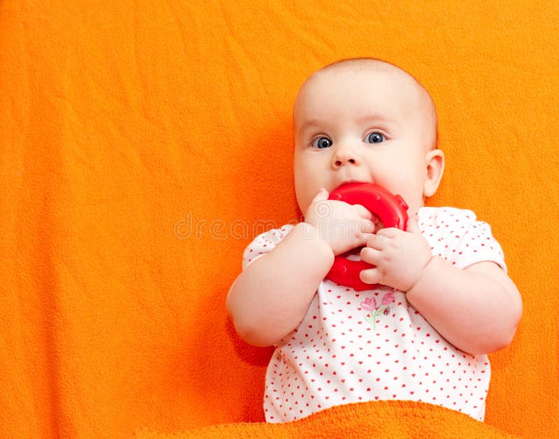 Infant with teething toy stock image. Image of childhood - 10946793