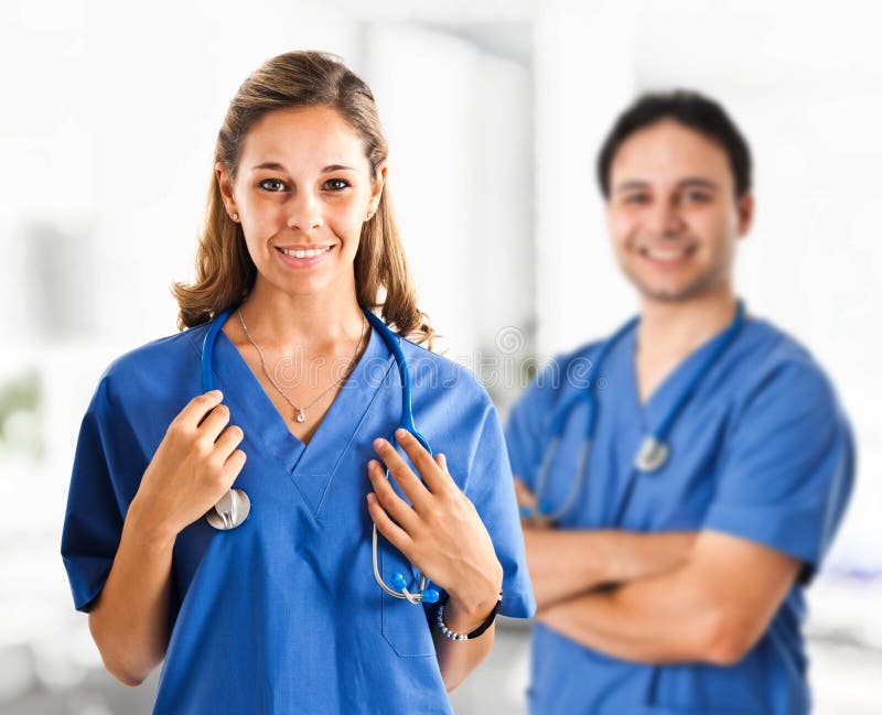 Infermiere e medico immagine stock. Immagine di cura - 21494617