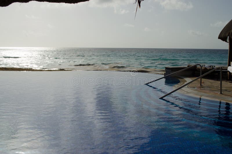 Infinity edge swiming pool stock image. Image of edge - 121485815