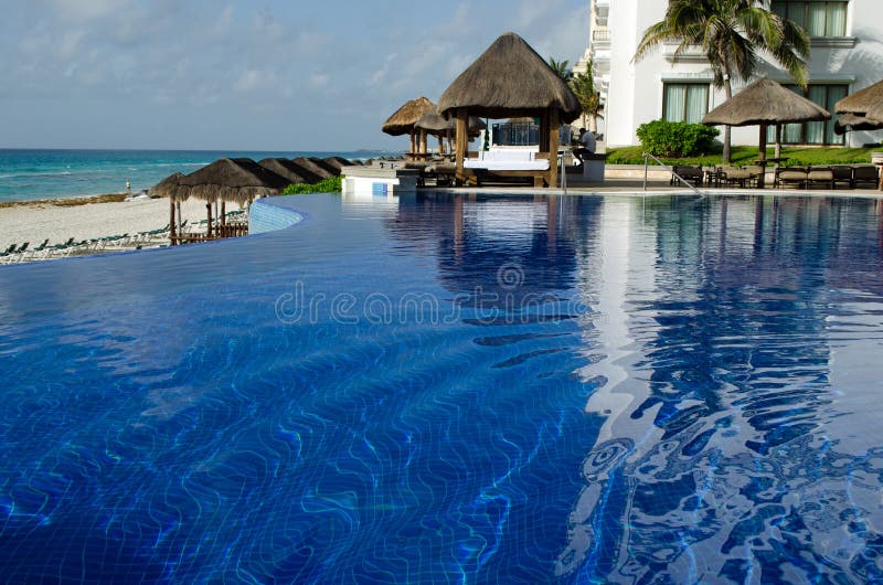Infinity edge swiming pool stock image. Image of edge - 121485839