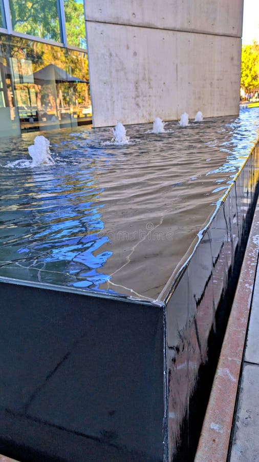 Infinity Edge of a Water Feature with Bubblers. Stock Photo - Image of ...