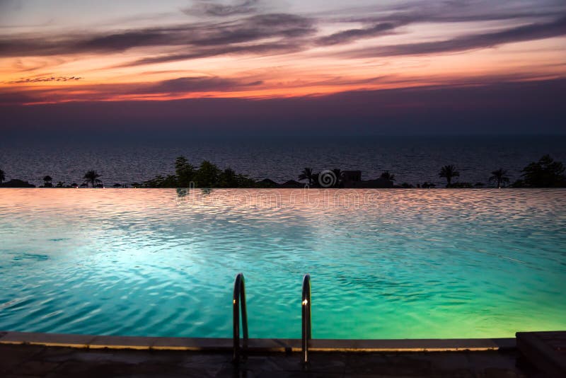 Infinity Pool Above Seaside at Dusk Stock Image - Image of scene, pool ...
