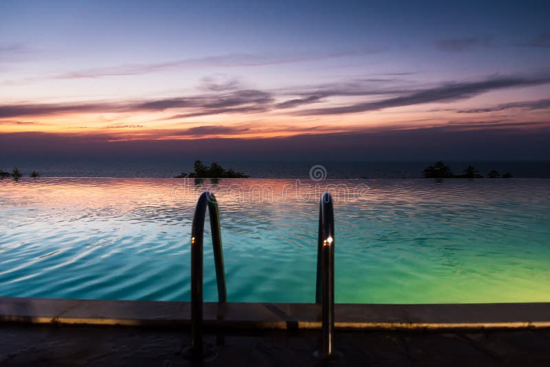 Infinity Pool Above Seaside at Dusk Stock Photo - Image of swimming ...