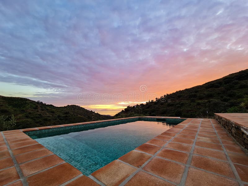 Infinity Pool with Beautiful Scenery and a Sunset Stock Image - Image ...