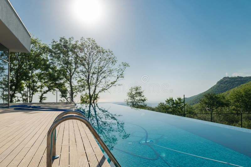 Infinity Pool on the Bright Summer Day Stock Image - Image of luxury ...