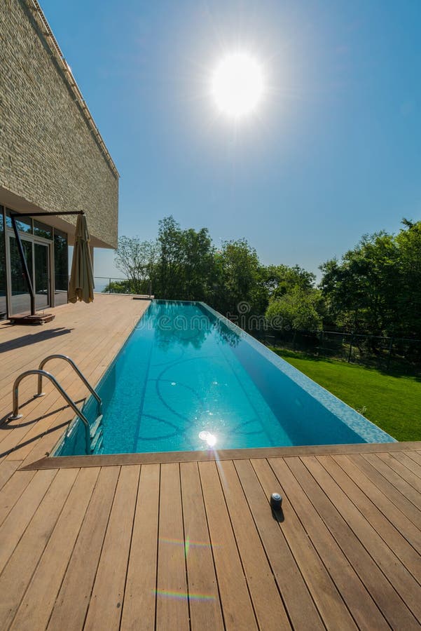 Infinity Pool on the Bright Summer Day Stock Image - Image of poolside ...