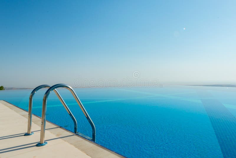 Infinity Pool on the Bright Summer Day Stock Photo - Image of hotel ...