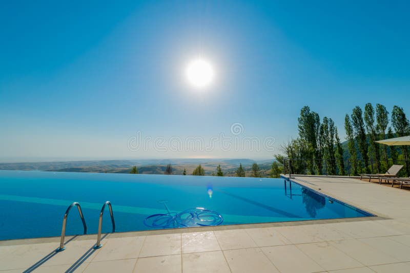Infinity Pool on the Bright Summer Day Stock Photo - Image of beach ...