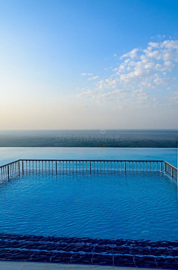 Infinity Pool with Crystal Blue Water View To Sea Ocean Stock Photo ...