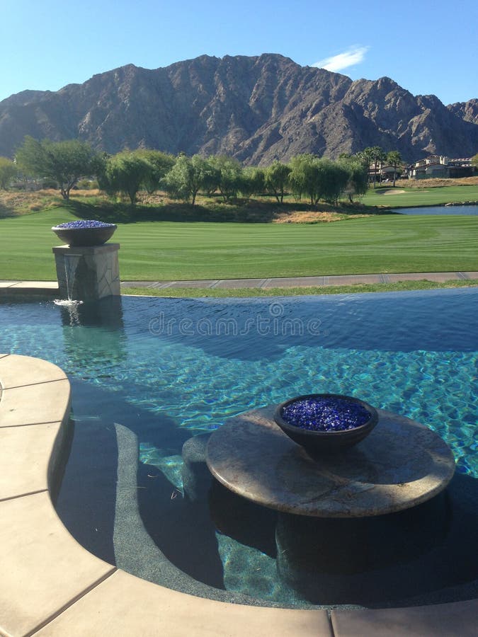Infinity Pool with Firepits on Golf Course in Palm Springs Stock Image ...