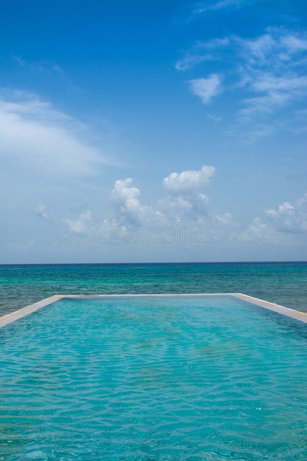 Luxury Hotel Infinity pool stock image. Image of tropical - 56957407