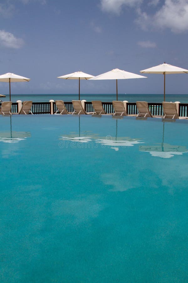 Reflections in Infinity Pool at a Resort Stock Photo - Image of ...