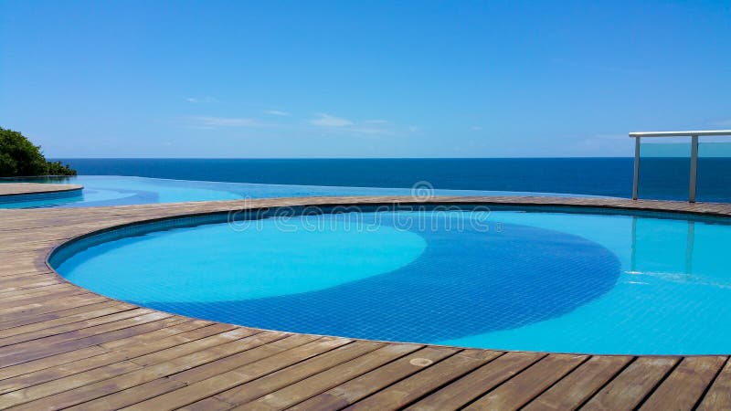 Infinity Pool with Views of the Sea and Blue Sky Stock Photo - Image of ...