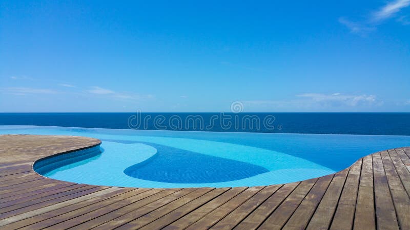 Infinity Pool with Views of the Sea and Blue Sky Stock Photo - Image of ...