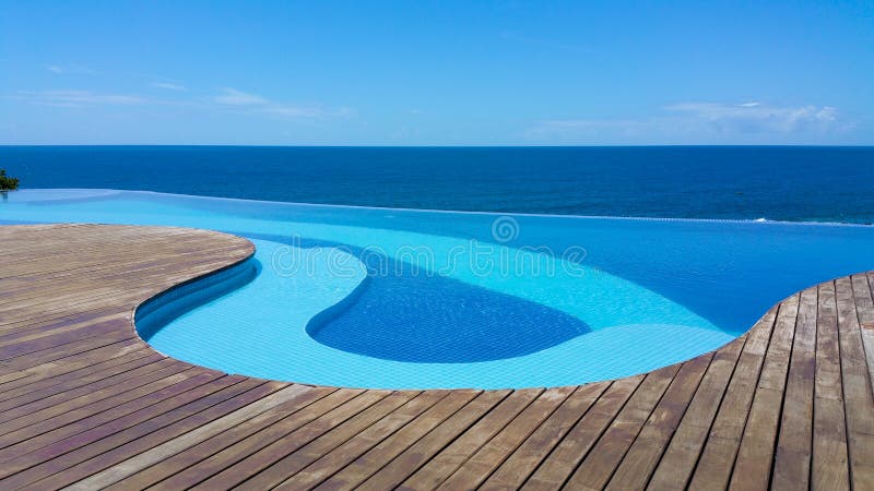 Infinity Pool with Views of the Sea and Blue Sky Stock Photo - Image of ...