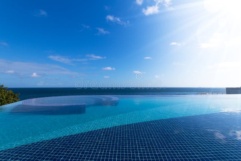 Infinity Pool with Views of the Sea and Blue Sky Stock Image - Image of ...