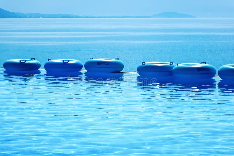 Infinity Swimming Pool with Sea and Mountain View Stock Photo - Image ...