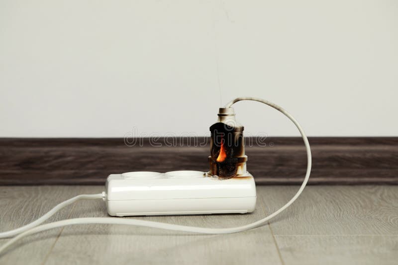 Inflamed Plug in Power Strip Indoors. Electrical Short Circuit Stock ...