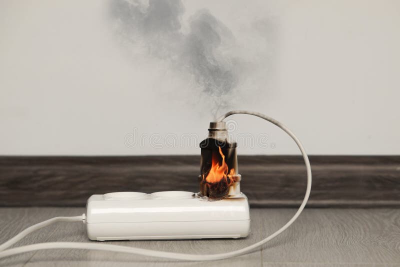 Inflamed Plug in Power Strip Indoors. Electrical Short Circuit Stock ...