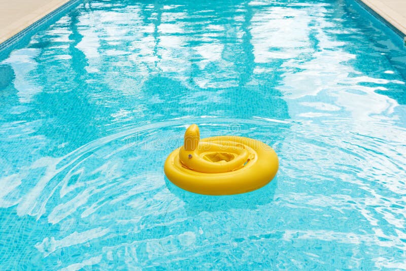 Inflatable Baby Float Ring in Open-air Swimming Pool Stock Photo ...