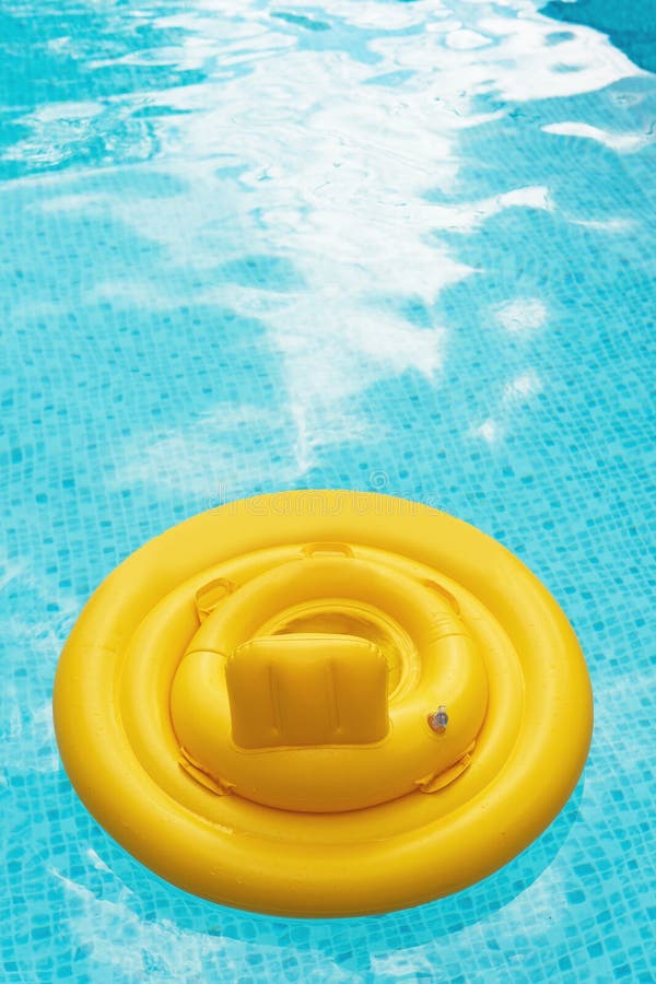 Inflatable Baby Float Ring in Open-air Swimming Pool Stock Photo ...