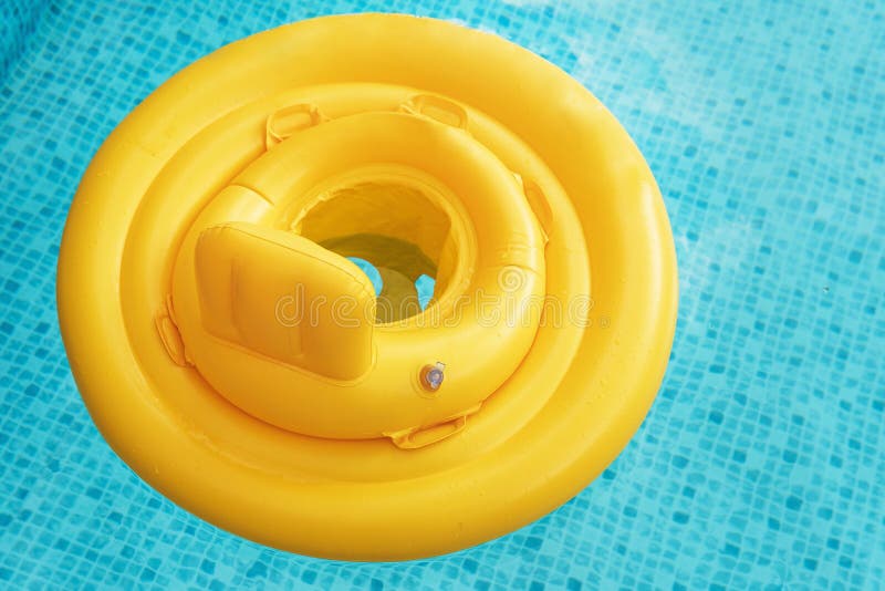 Inflatable Baby Float Ring in Open-air Swimming Pool Stock Photo ...