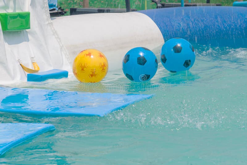 Inflatable ball water pool stock photo. Image of swimming - 132200348