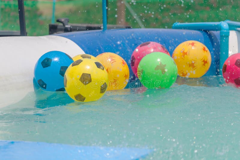 Inflatable ball water pool stock photo. Image of swimming - 132200348