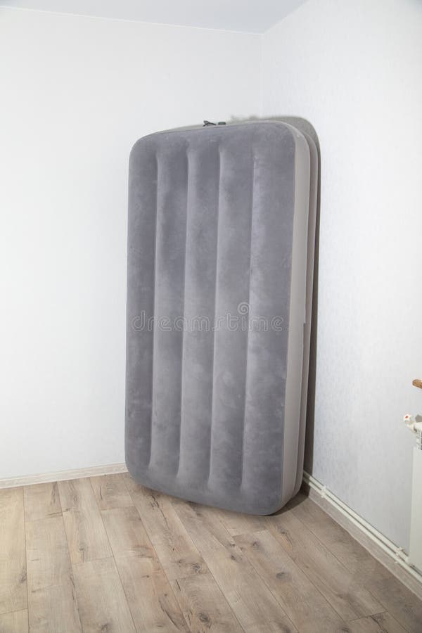 Inflatable bed in the room stock image. Image of pump - 340122127