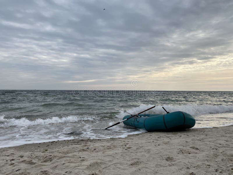 Inflatable Boad on the Beach on Sunset Stock Photo - Image of vacation ...