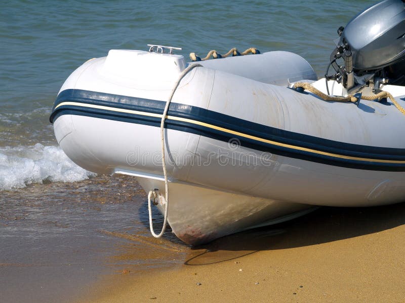 Inflatable Boat with Motor on a Beach Stock Photo - Image of nose ...