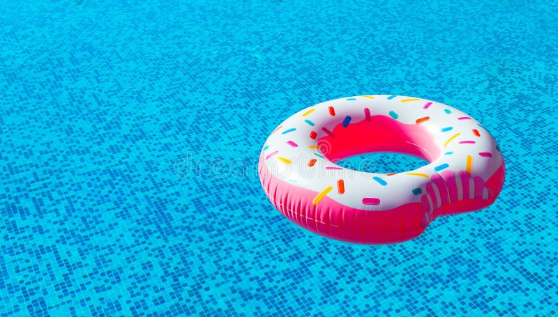 Inflatable Colorful Rubber Donut Float Ring in Swimming Pool on Sunny ...